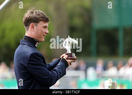 Freddie Gingell with the Champion Conditional Jockey trophy at Sandown ...