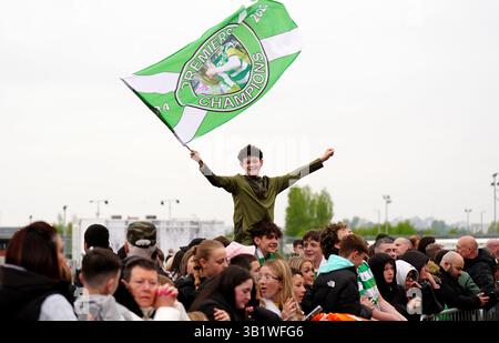 Celtic fans celebrate victory in the Scottish Premiership outside ...