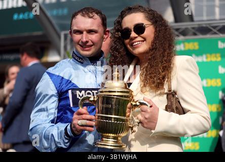 Jockey Sean Bowen with the trophy after winning the bet365 Gold Cup ...