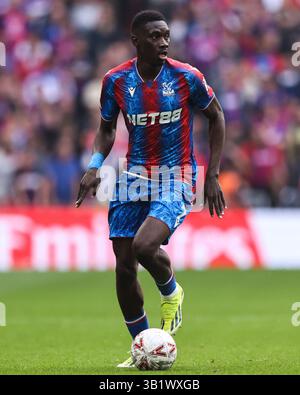 Crystal Palace forward Ismaila Sarr (7) shoots at goal as Manchester ...