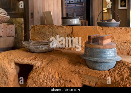 A traditional style kitchen in a residence at rural Chinese village ...