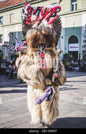 A kurent without his mask on carnival in Slovenia. It's a traditional ...