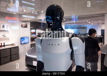 Tokyo, Japan. 25th Apr, 2025. Tesla Optimus humanoid robot on display ...