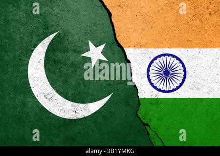 Flags of Pakistan and India painted on the concrete wall with soldier ...