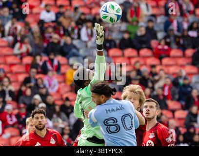 New York City FC's Justin Haak, third from right, jumps for the ball ...