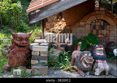 An Okinawan "shisa" (mythical lion dog intended to scare away evil) is ...