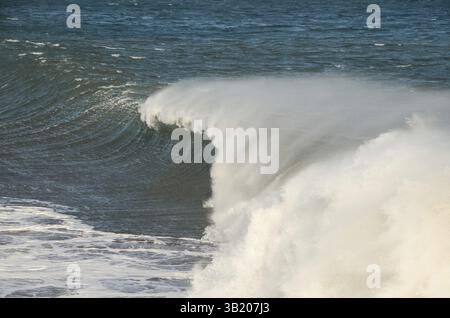 Big Blue Wave Breaks in the Atlantic Ocean Stock Photo - Alamy