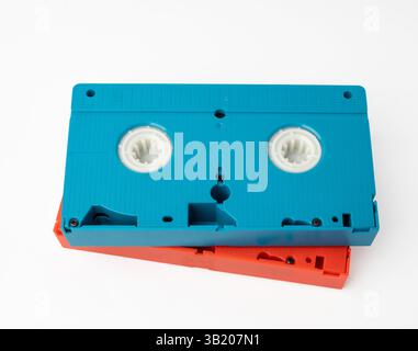 An old colored vhs tapes isolated on a white background Stock Photo - Alamy