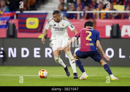 Pau Cubarsi of FC Barcelona and Kylian Mbappe of Real Madrid in action ...