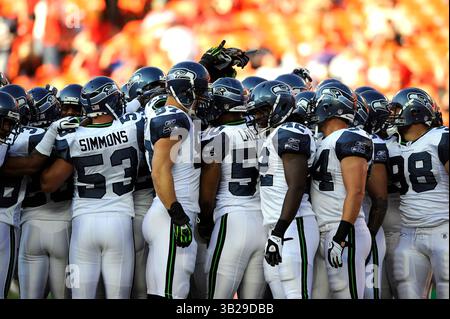 The Seattle Seahawks huddle up against the New England Patriots during ...