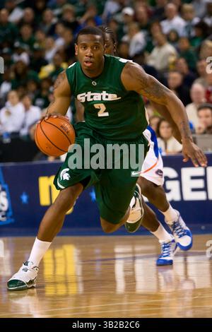 Michigan State forward Raymar Morgan, left, fights for a rebound with ...