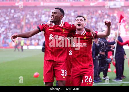 Liverpool's Ryan Gravenberch, left, celebrates with teammates after ...