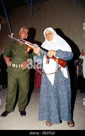 Mar 10, 1999; Baghdad, Iraq; Iraqi women receive automatic weapons ...