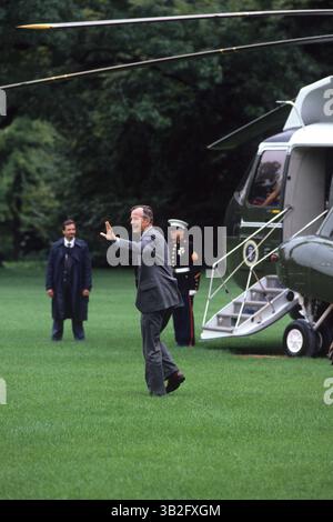 U.S. President George W. Bush waves to thousands of Marines at Camp ...