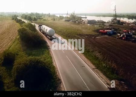 Transportation of distillation column. Bulky cargo Stock Photo - Alamy