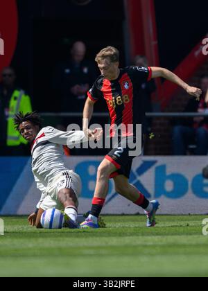 Manchester United's Patrick Dorgu, left, fights for the ball with ASEAN ...