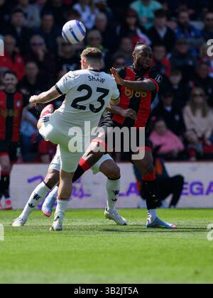 Bournemouth's Antoine Semenyo (right) battles with Arsenal's Piero ...