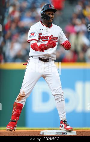 Cleveland Guardians' Angel Martínez (1) celebrates with Steven Kwan (38 ...