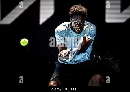 Taylor Fritz of the U.S. plays a return to Jordan Thompson of Australia during their men's ...