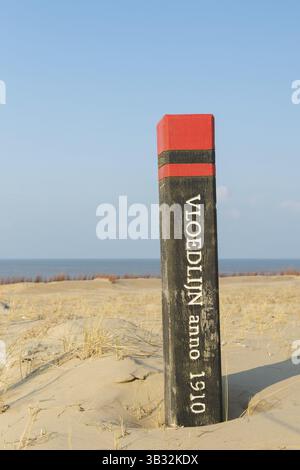 High tide pole on Dutch wadden island Texel Stock Photo - Alamy