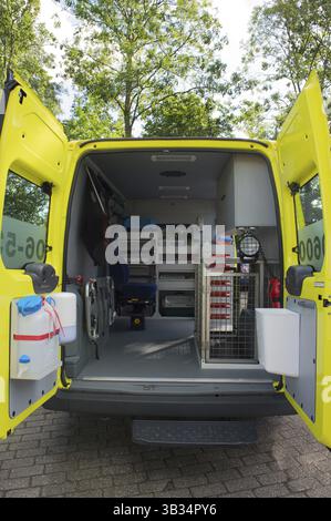 Interior ambulance for animals with cages and chair Stock Photo - Alamy