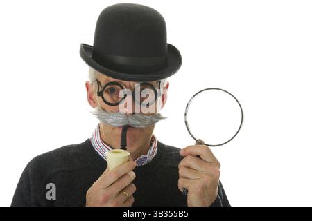 Portrait of a funny inspector with a big magnifier for investigation ...
