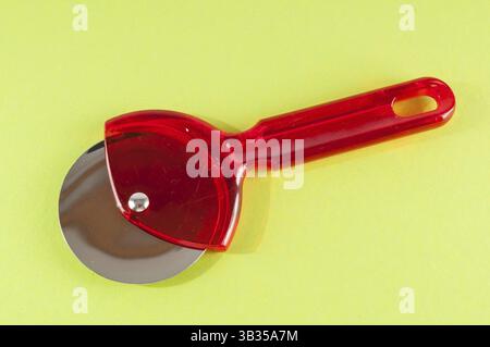 Picture of Plastic Red Pizza Cutter Slicer Knife Stock Photo - Alamy
