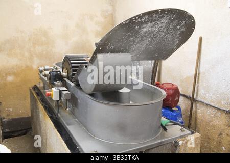 Paper mill interior with device Stock Photo - Alamy