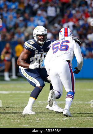 Los Angeles Chargers offensive tackle Ryan Nelson (74) looks to make a ...