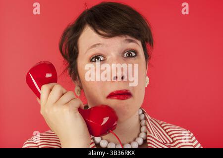 Woman crying while having a sad phone call Stock Photo - Alamy