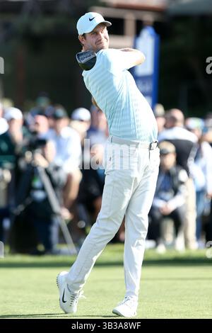 Harris English, of the United States, tees off on the first hole during ...