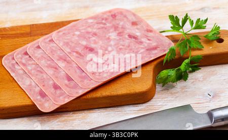 Slicing chopped ham from pork meat, no people Stock Photo - Alamy