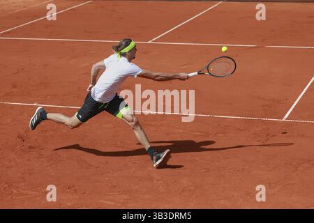 Alexander Zverev, of Germany, returns a ball to Daniil Medvedev, of ...
