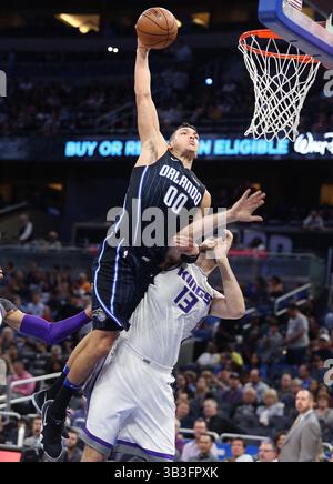 Orlando Magic forward Aaron Gordon goes after a loose ball during the ...