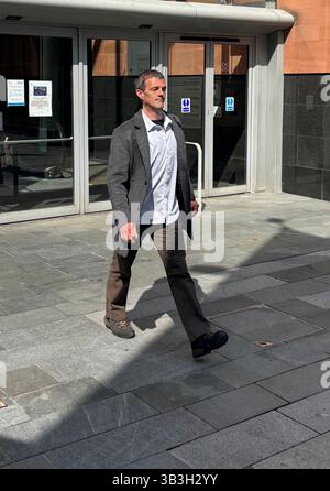Martin Frost, 48, leaving Manchester Magistrates' Court after pleading ...