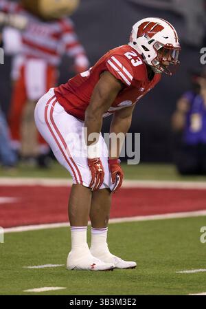 Wisconsin running back Jonathan Taylor runs a drill at the NFL football ...