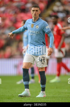 Manchester City's Phil Foden and Nottingham Forest's Elliot Anderson ...