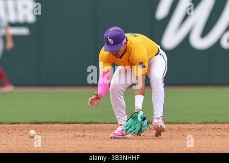 LSU Tigers shortstop Steven Milam (4) throws to first base during an ...