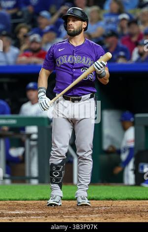 Colorado Rockies outfielder Nick Martini (35) warms up before a ...
