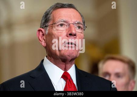 Senate Majority Whip John Barrasso (R-Wyo.) speaks with reporters at ...