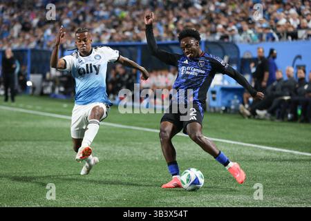 San Jose Earthquakes' Jamar Ricketts, left and Vancouver Whitecaps ...