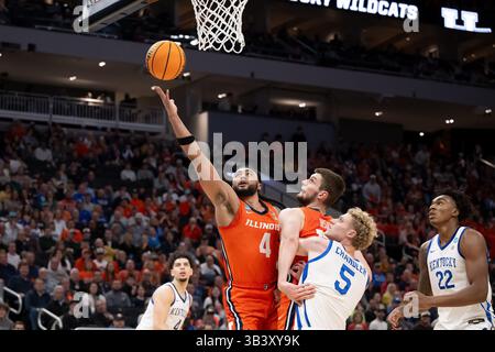 Kentucky guard Collin Chandler (5) shoots over Louisville guard Isaac ...