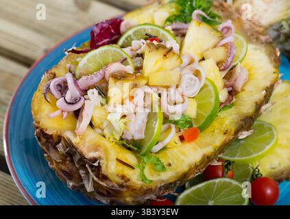 Stuffed pineapple with squid and lime Stock Photo - Alamy