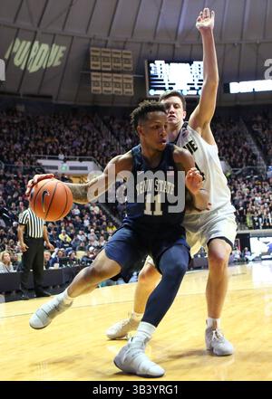Penn State's Lamar Stevens (11) dunks during the second half of an NCAA ...