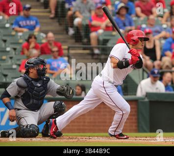Texas Rangers' Shin-Soo Choo catches a ball during spring training ...