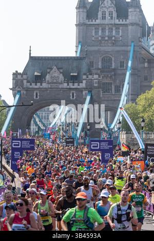 Club Runners crossing Tower Bridge in the 2025 TCS London Marathon ...
