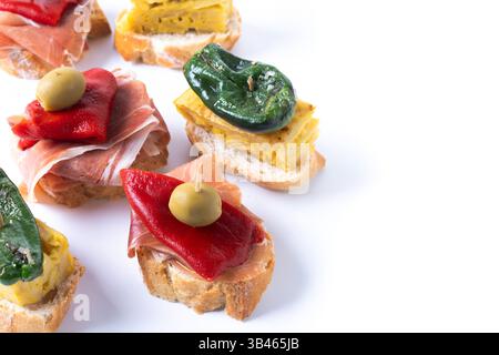 Traditional Spanish pintxos isolated on white background Stock Photo ...