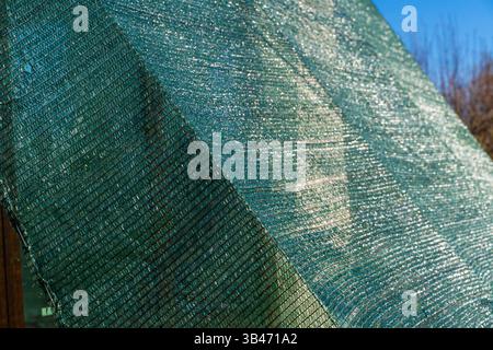 Sunshade net, green color. Protection from heat and scorching sun Stock ...