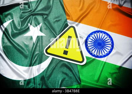 Danger sign on the flags of Pakistan and India Stock Photo - Alamy