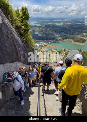 Tourists at the top of the Piedra del Penon or Penon de Guatape, near ...